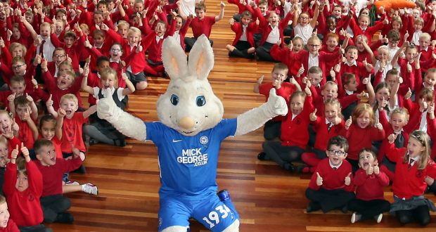 Posh’s Peter Burrow hops across the county border to visit children in ...